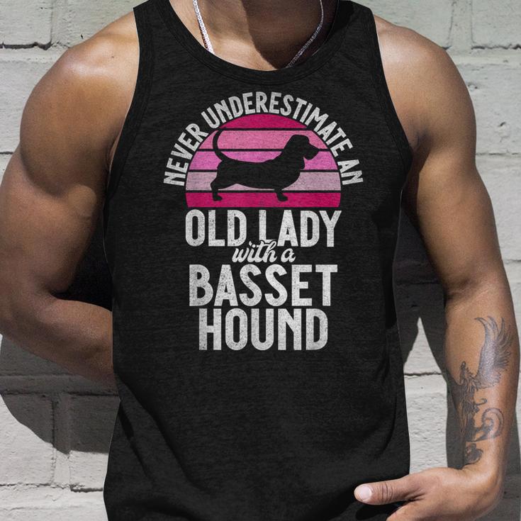 Never Underestimate An Old Lady With a Basset Hound Tank Top - Monsterry