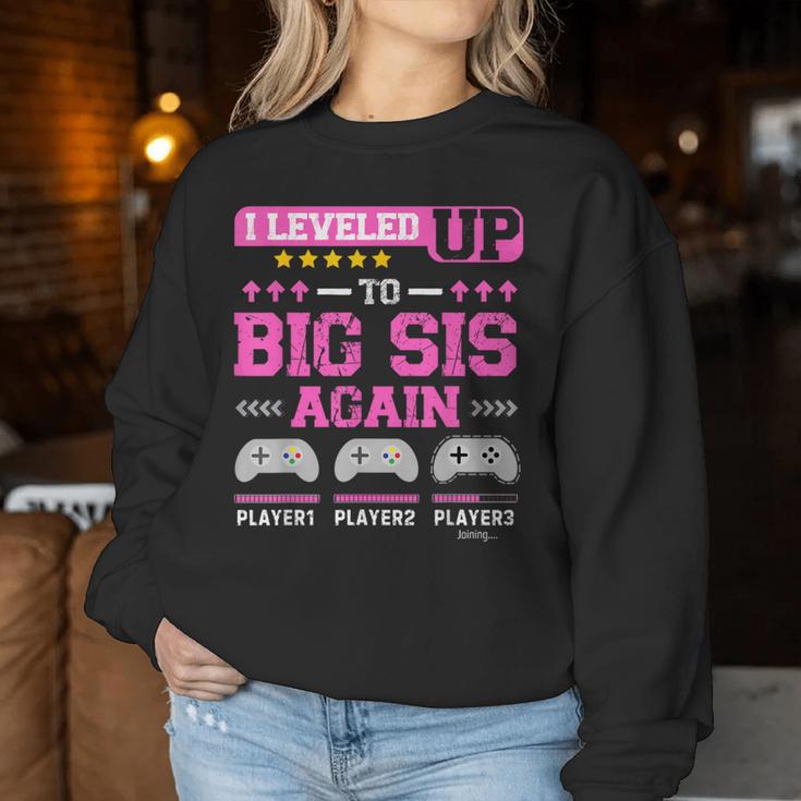 I Leveled Up To Big Sis Again 2025 Gamer Big Sister Women Sweatshirt ...